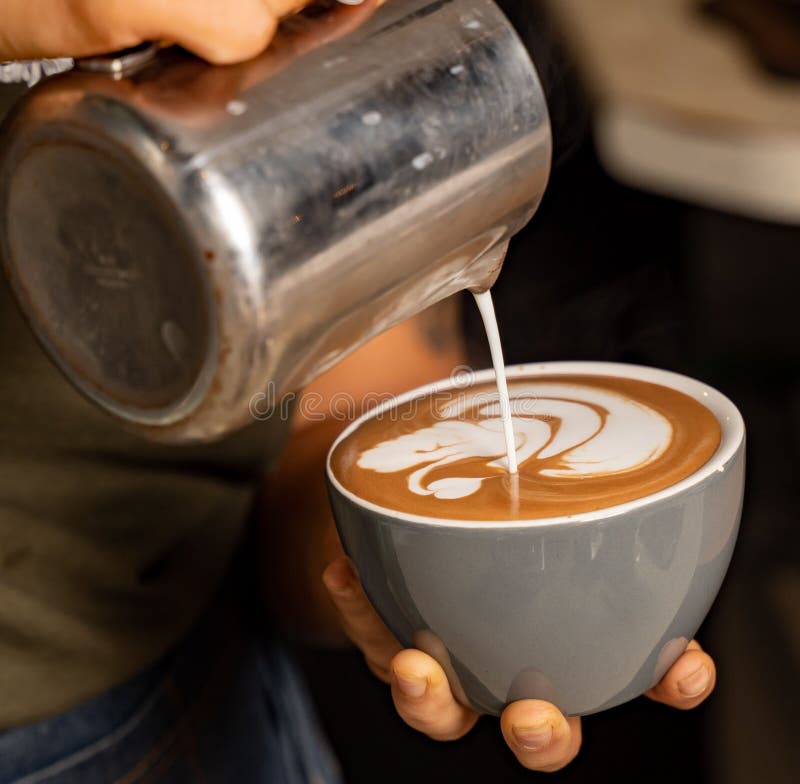 Barista Making a Coffee Latte Art on a Cup Stock Image - Image of latte ...