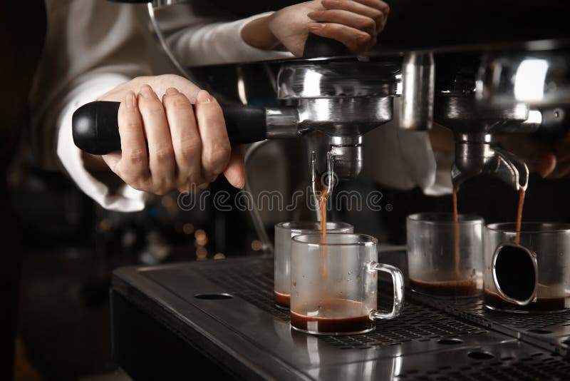 Barista Making Espresso Using Professional Coffee Machine, Closeup ...