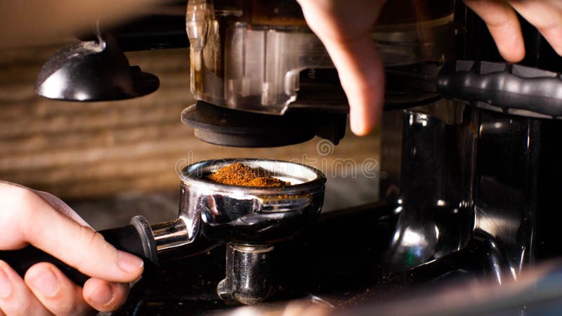 Barista is Grinding Coffee with a Hand Coffee Grinder. Stock Photo ...