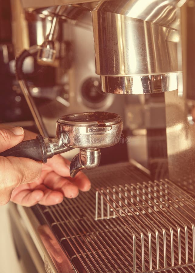 Barista Prepares Coffee on a Coffee Machine in a Cafe Stock Photo ...