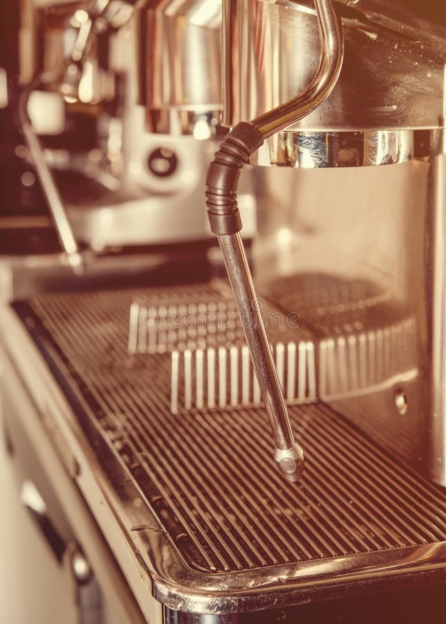 Barista Prepares Coffee on a Coffee Machine in a Cafe Stock Image ...