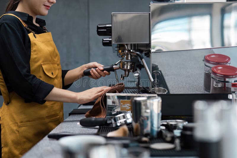 Barista Preparing Espresso with Professional Coffee Machine in Modern ...