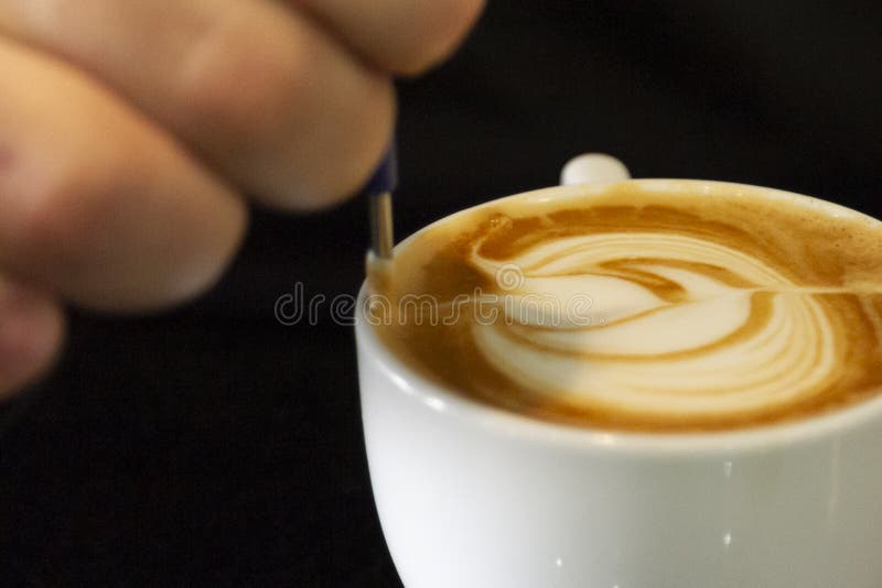 Barista`s Hand Drawing a Picture on the Coffee Cup Stock Photo - Image ...