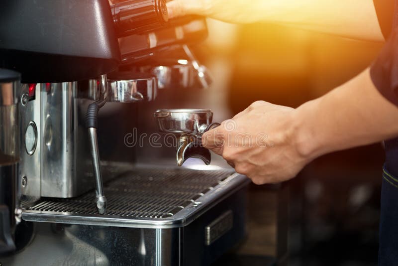 The Barista`s Hand is Making Coffee with a Machine Stock Image - Image ...