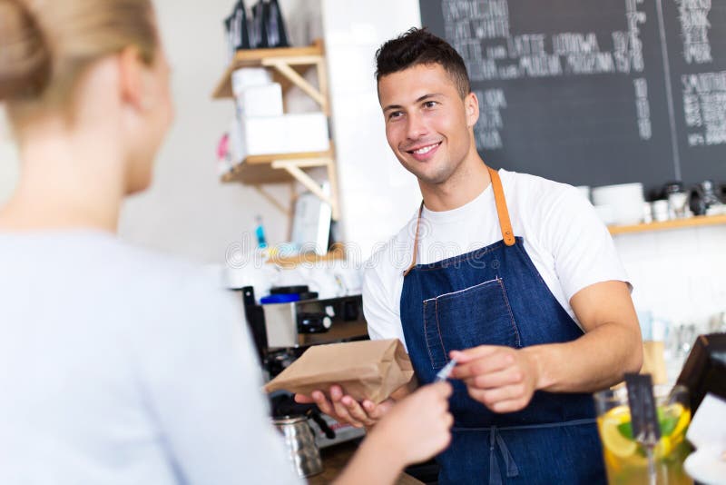 Barista Serving Customer in Coffee Shop Stock Photo - Image of ...