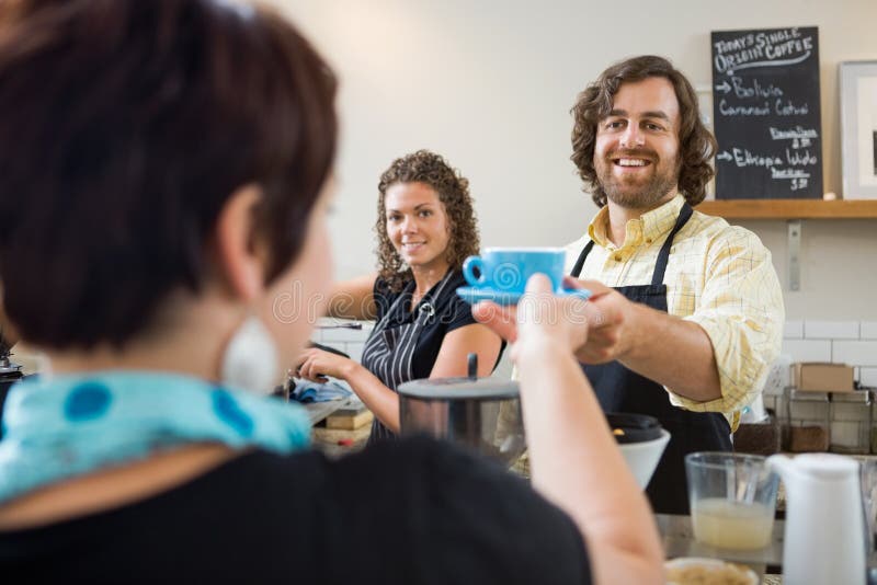 Barista Serving Customer stock photo. Image of barista - 36517916