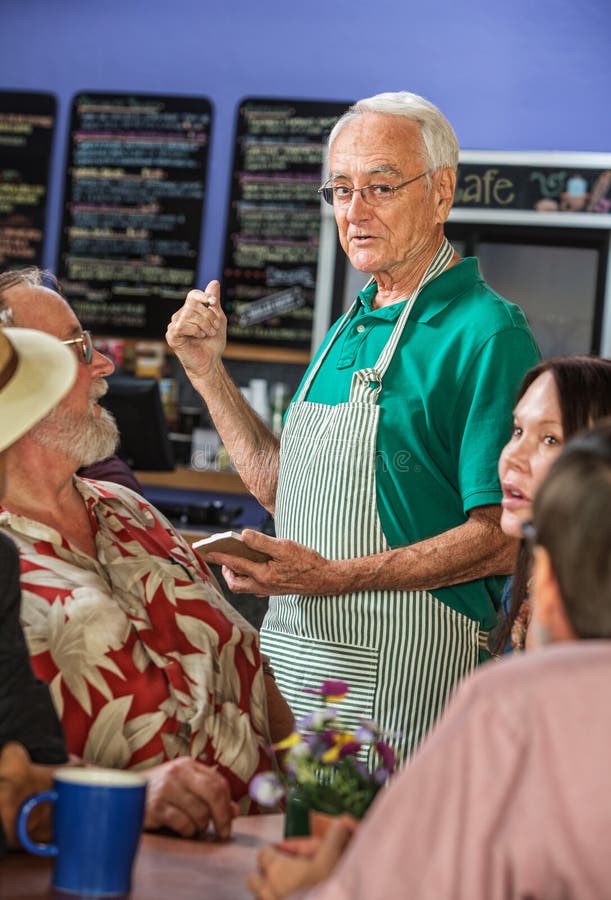 Barista Showing Customers Menu Stock Photo - Image of entrepreneur ...