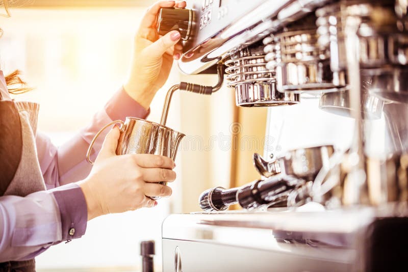 Barista Using Coffee Machine for Making Coffee in the Cafe Stock Photo ...