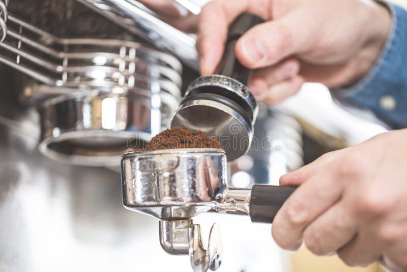 Barista Using Coffee Machine for Making Coffee in the Cafe Stock Photo ...