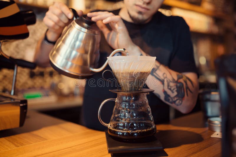 Barista at Work in a Coffee Shop Stock Photo - Image of preparation ...