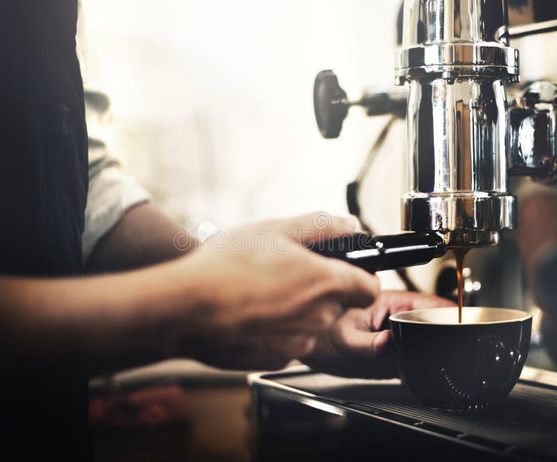 Barista Working in a Coffee Shop, Barista Pouring Milk in To Coffee ...