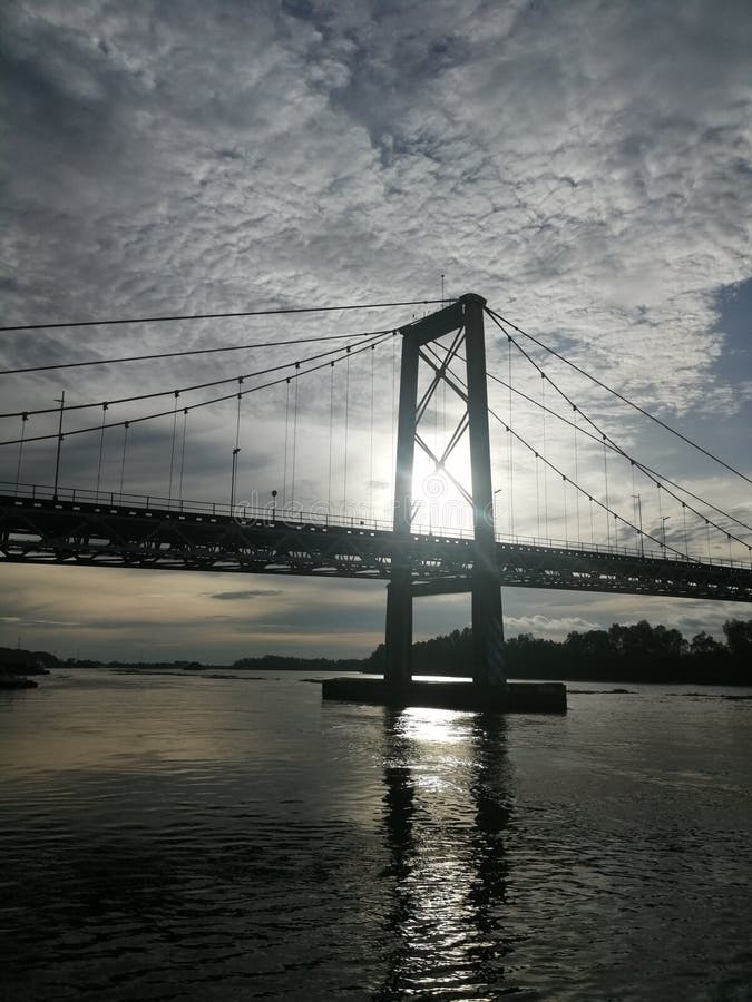Barito Bridge on Sunset stock image. Image of cloud - 261866437