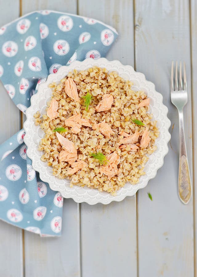 Barley groats in a plate stock image. Image of cuisine - 34479281