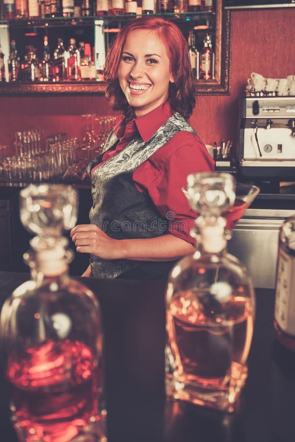 Barmaid behind bar counter stock image. Image of barmen - 49695079
