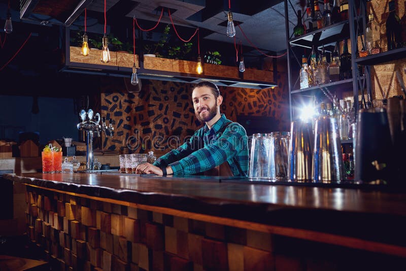 A Barman with Beard Behind Counter in the Bar Stock Image - Image of ...