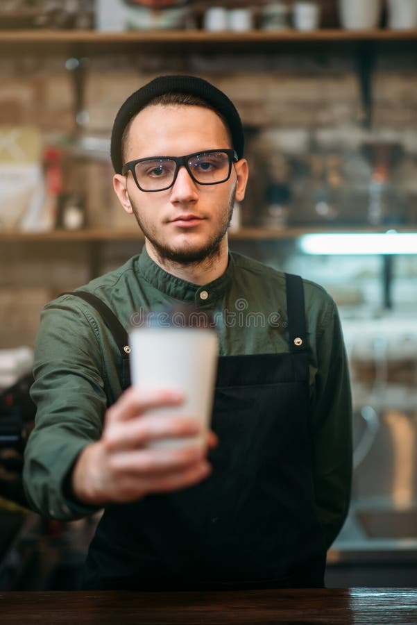 Barman in Black Apron Stretches Plastic Cup Stock Photo - Image of ...
