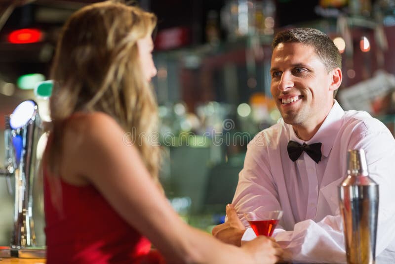 Barman Chatting To Pretty Customer Stock Photo - Image of people, adult ...