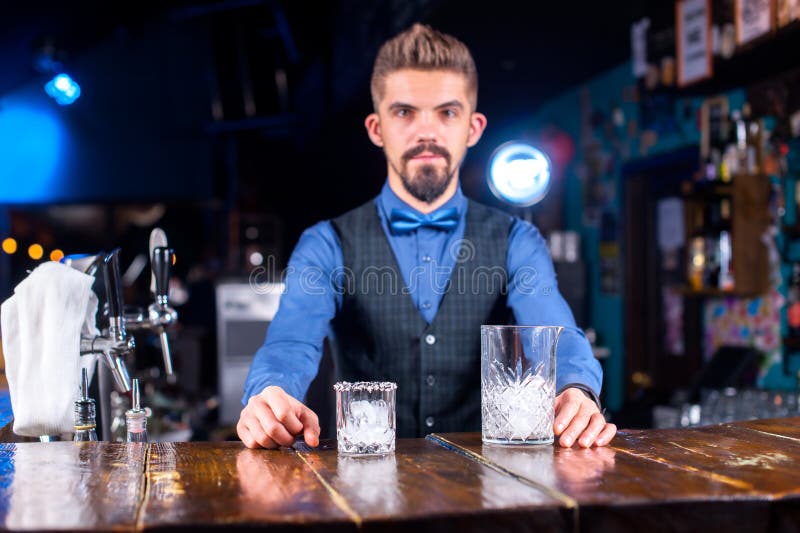 Barman Mixes a Cocktail on the Saloon Stock Photo - Image of metal ...