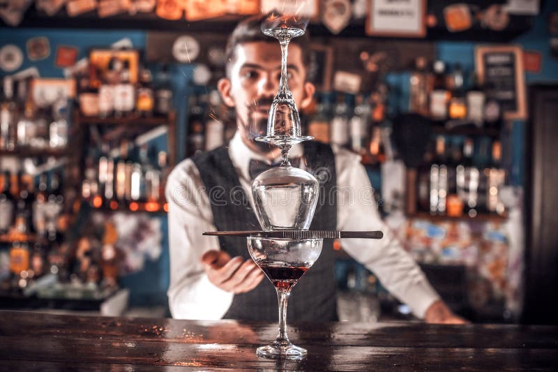 Barman Formulates a Cocktail Behind the Bar Stock Image - Image of ...