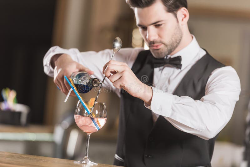 Barman making cocktail stock photo. Image of transparent - 104983730