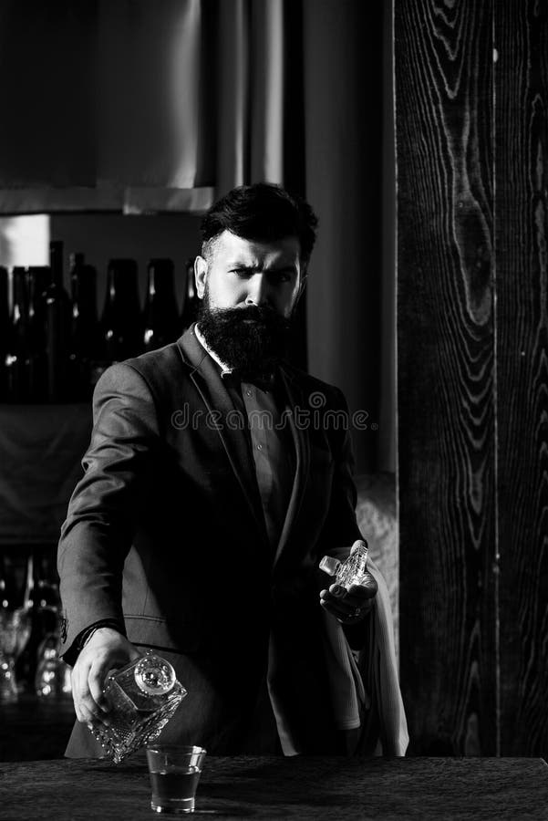 Barman Pouring Brandy in Whiskey Glass. Bar Man with Brandy or Cognac ...