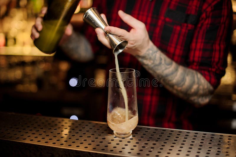Barman Pouring a Portion of Alcoholic Drink Using Jigger Stock Image ...