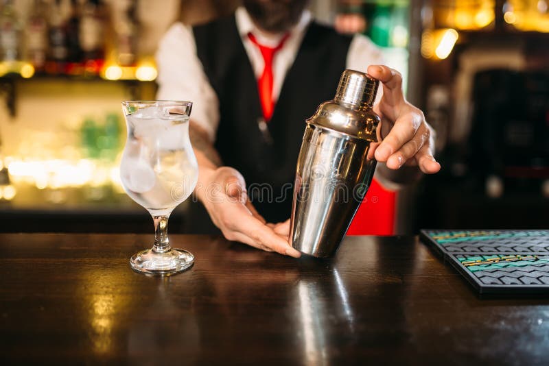 Barman with Shaker Behind a Bar Counter Stock Image - Image of bottle ...