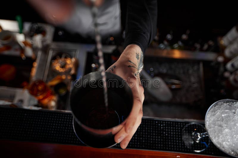 Barman Stirring Cocktail in Shaker with Spoon Stock Photo - Image of ...