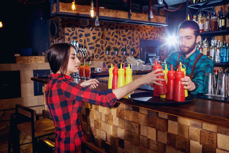 Barman and Waiter Work Together with the Team at the Bar Restau Stock ...