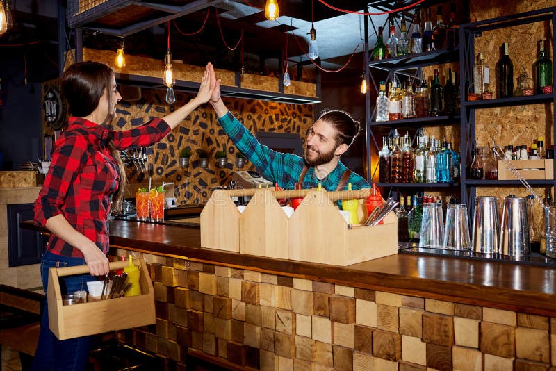 Barman and Waiter Work Together with the Team at the Bar Restau Stock ...