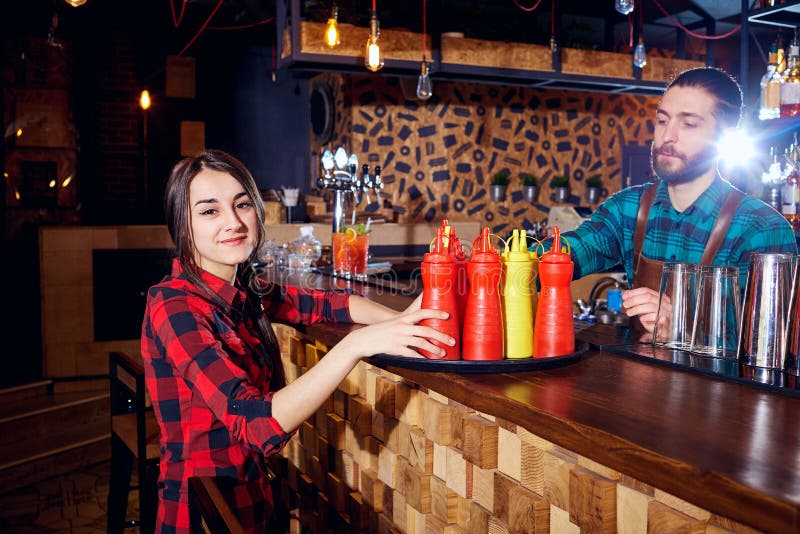 Barman and Waiter Work Together with the Team at the Bar Restau Stock ...
