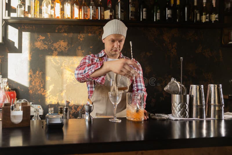 Barman at Work, Preparing Cocktails. Concept about Service and ...