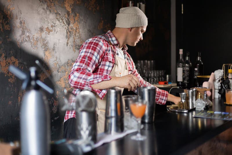 Barman at Work, Preparing Cocktails. Concept about Service and ...