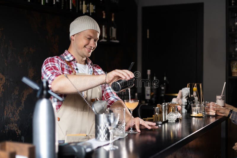 Barman at Work, Preparing Cocktails. Concept about Service and ...