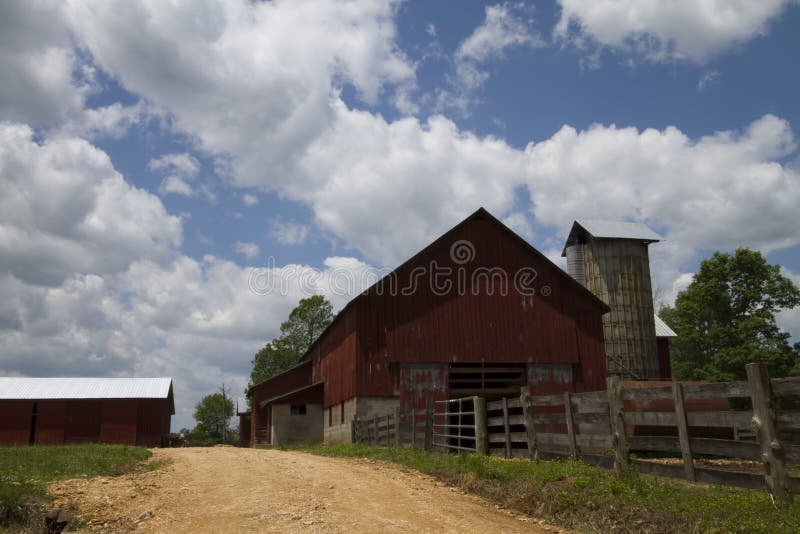 Barn and Fluffy White Cloud Landscape Stock Image - Image of silo ...