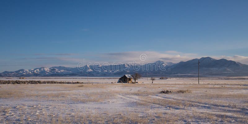 Barn in an open snow field stock photo. Image of open - 37254266