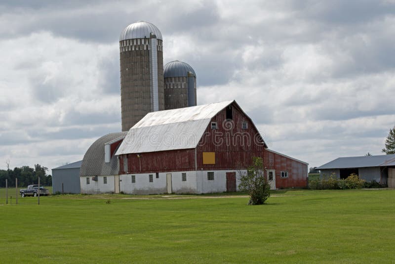 A Barn with Silos stock photo. Image of buildings, landscapes - 58586892