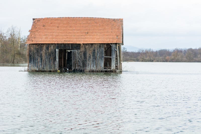 Barn surrounded with water stock image. Image of disaster - 39419009