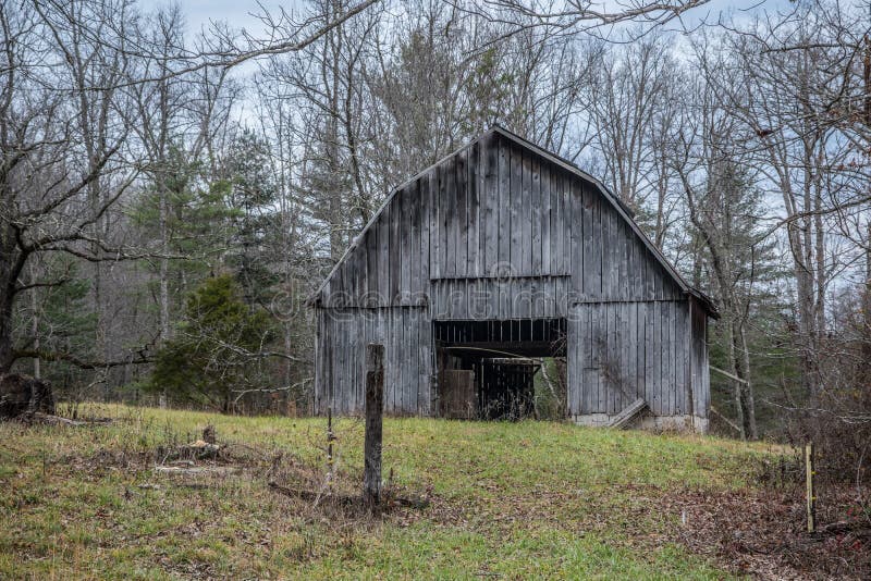 Barn up on a hill stock photo. Image of grey, aged, hillside - 264987308