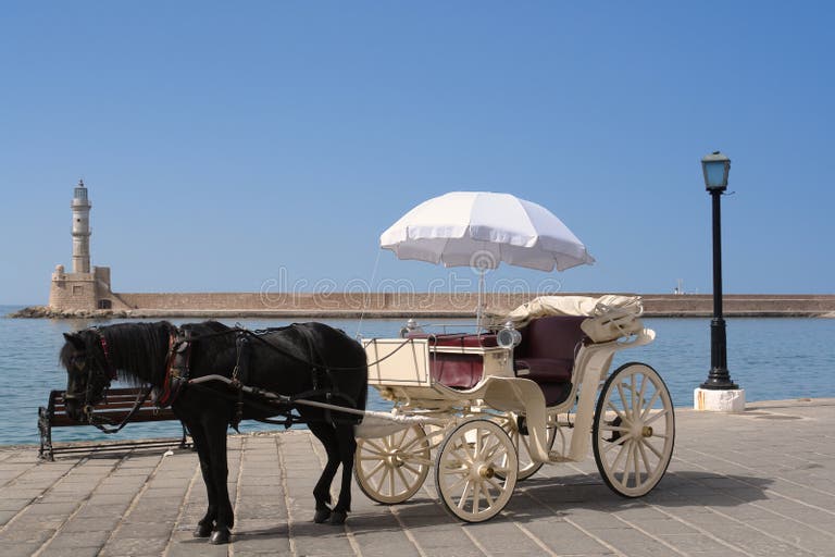 Barouche in chania harbor stock image. Image of tourism - 5019427