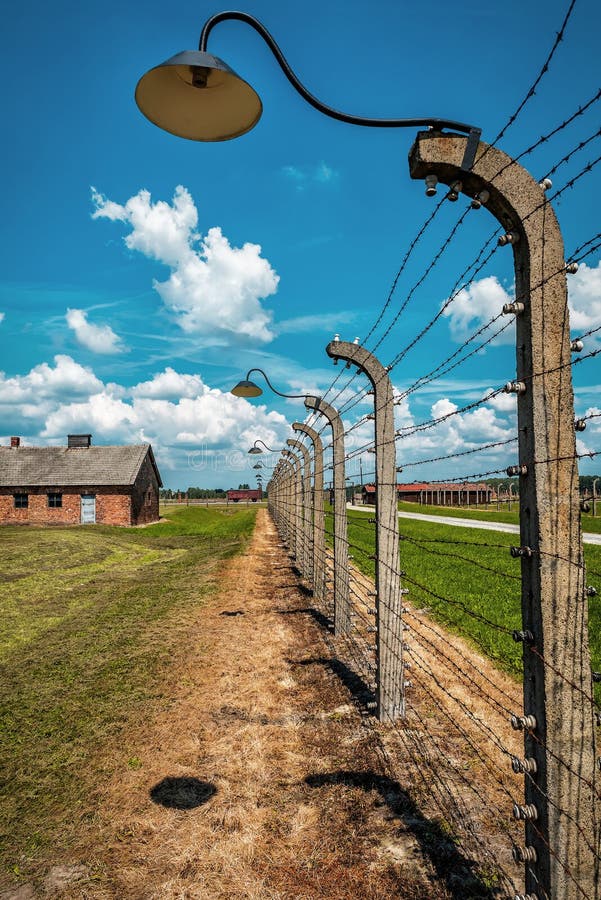 Barracks and Electric Fence in Old Concentration Camp Prison Editorial ...