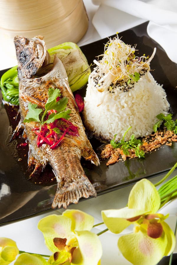 Barramundi, Served with Fragrant Jasmine Rice Stock Image - Image of ...