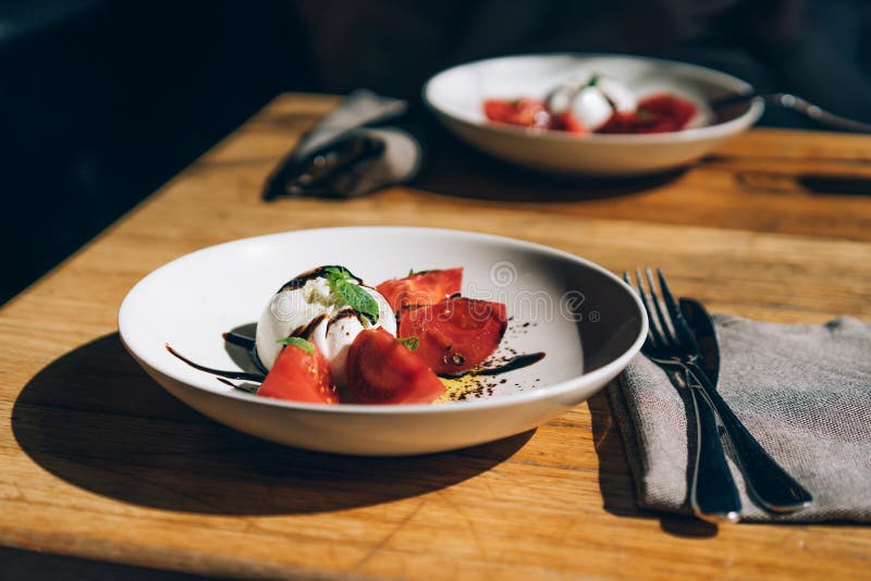 Barrata and Tomatoes on a Plate Stock Photo - Image of mediterranean ...