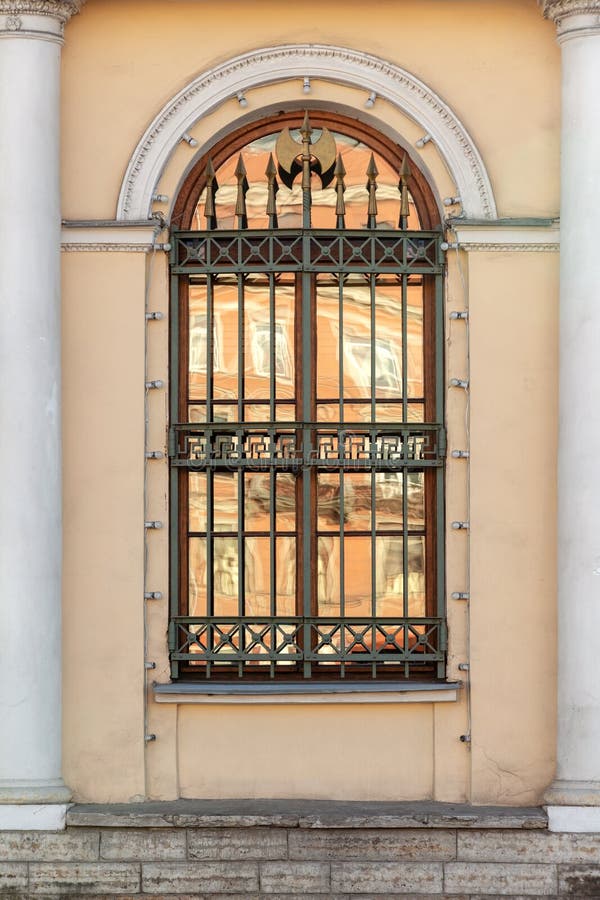 Barred Old Window between Two White Columns Stock Image - Image of ...