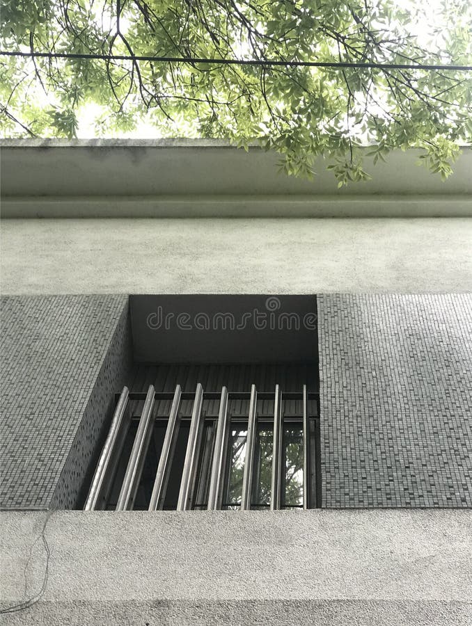 Barred Window of a Building Seen from Below Stock Photo - Image of ...