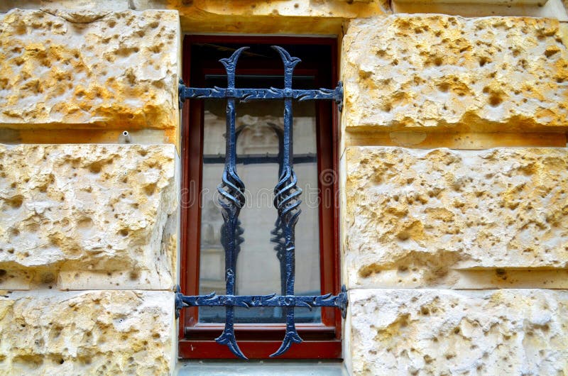 Barred Window on Street Level Stock Photo - Image of metal, drawing ...