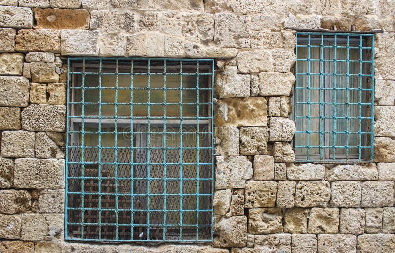Barred Windows On Wall Of Prison Stock Image - Image of gaol, stone ...