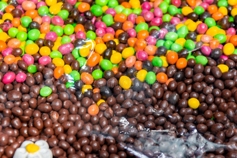 A barrel full of sweets. stock image. Image of flower - 213488839