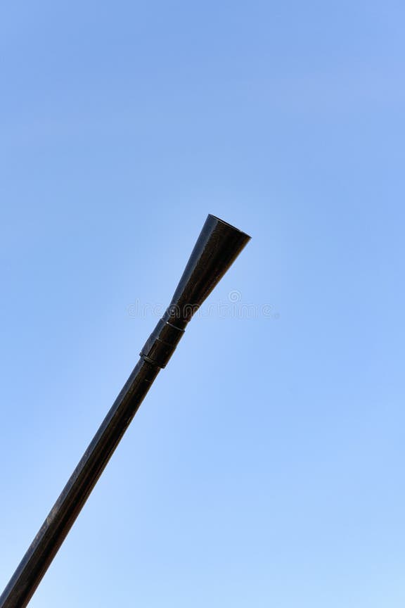 Barrel of a Machine Gun in a Diagonal Frame Against a Blue Sky Stock ...