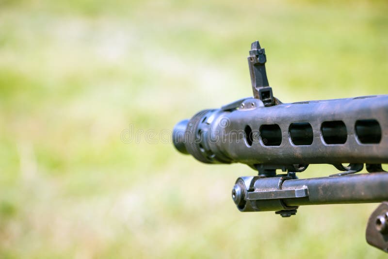 Barrel of a machine gun stock photo. Image of combatant - 98101032